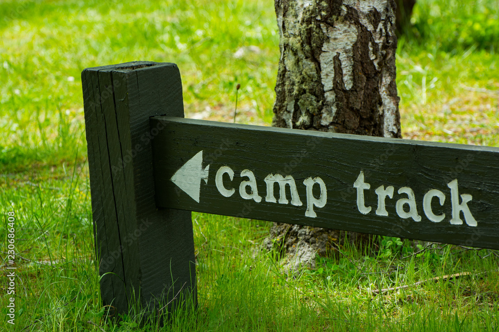 Sign indicating a walking track for a campsite Stock Photo | Adobe Stock