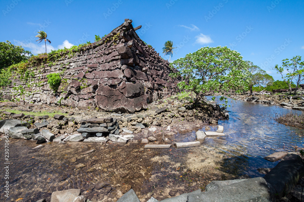 A channel and town walls in Nan Madol - prehistoric ruined stone city ...