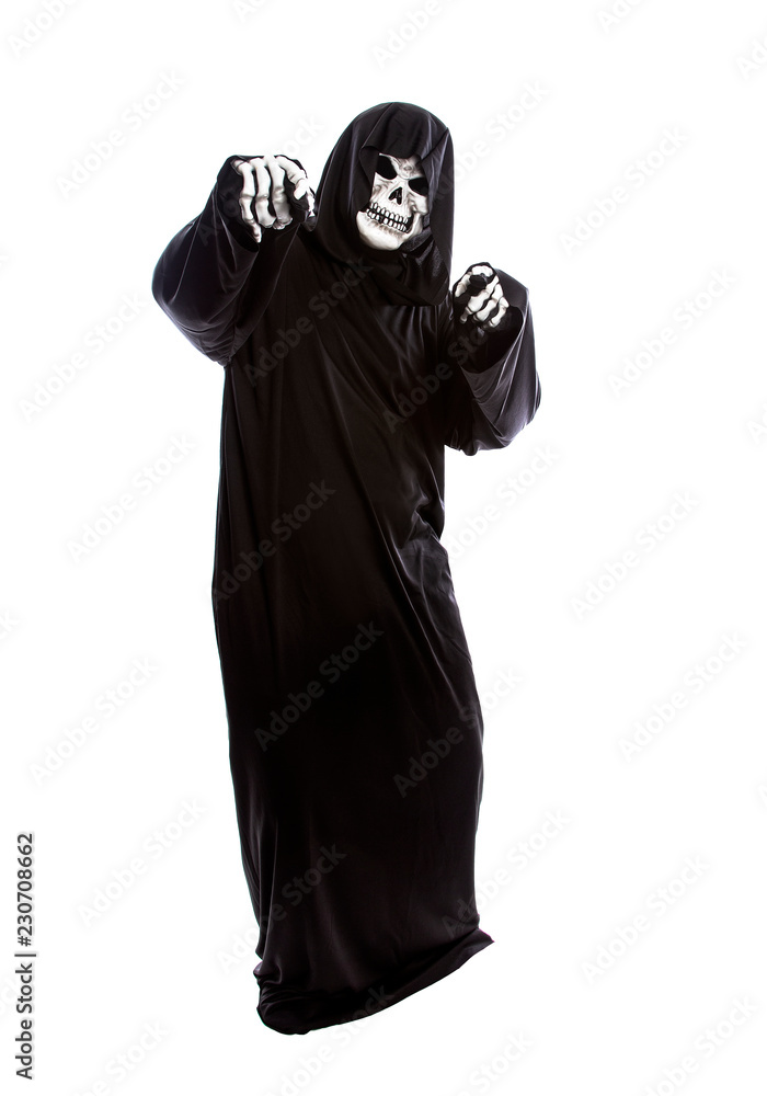 Halloween costume of a skeleton grim reaper wearing a black robe on a ...