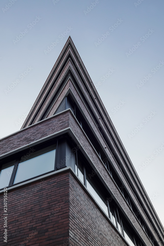 Building corner in facing brickwork Stock Photo | Adobe Stock