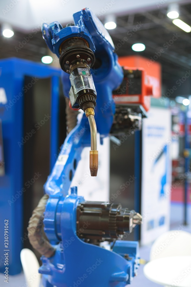 Automatic robot arm working in industrial environment Stock Photo ...