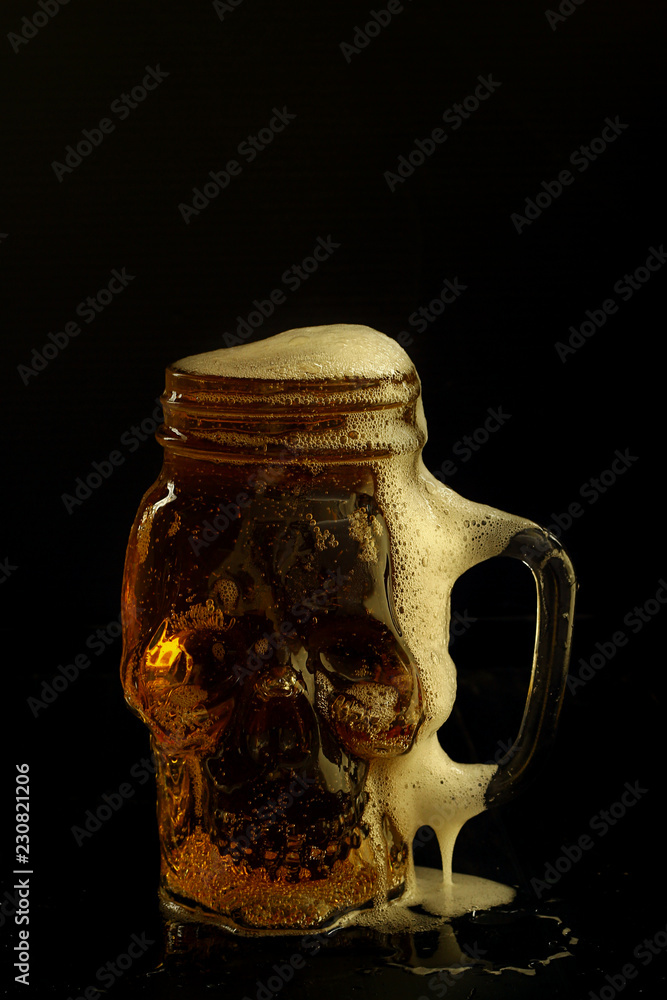 Beer in a Skull glass Stock Photo | Adobe Stock