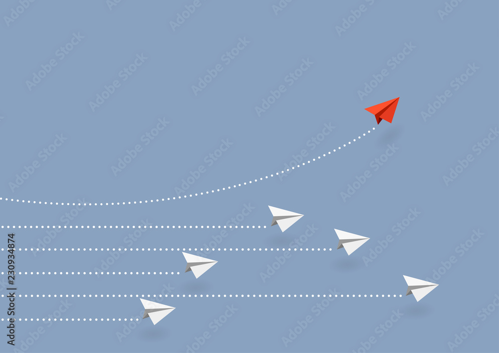 Business concept. Red paper airplane flying changing direction on blue ...