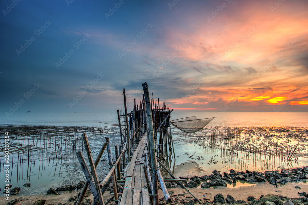 Poster Long exposure image of "langgai" during beautiful sunset , the ...
