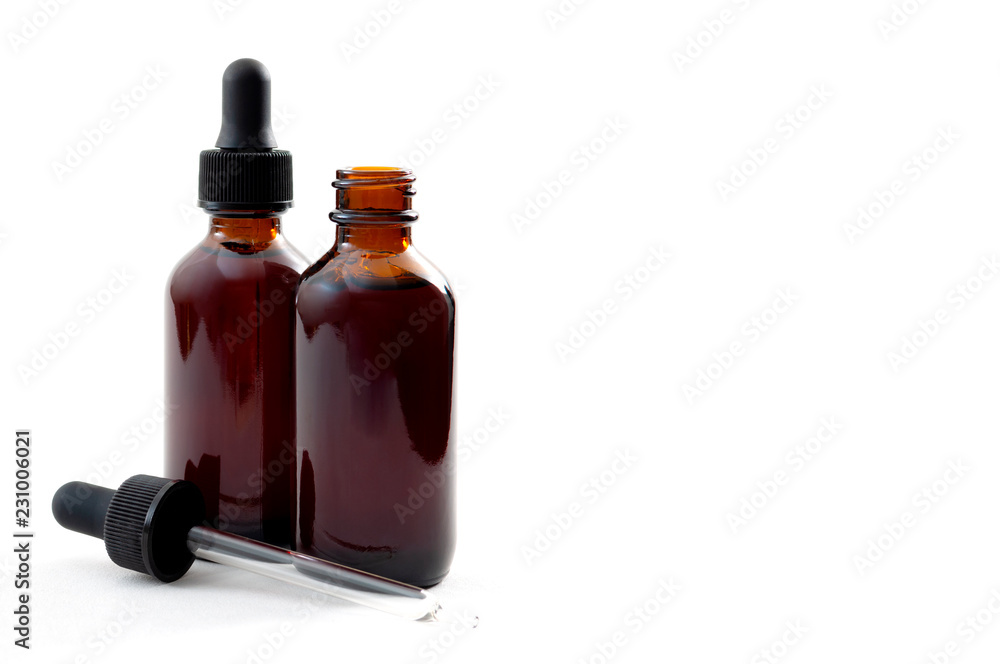 Homeopathic remedy and liquid tincture medicines concept with close up ...