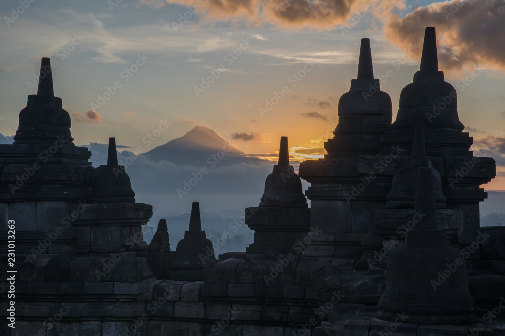 First morning light on Mount Merapi viewed from the Borobudur Temple in ...