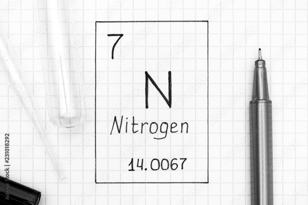 Handwriting chemical element Nitrogen N with black pen, test tube and ...