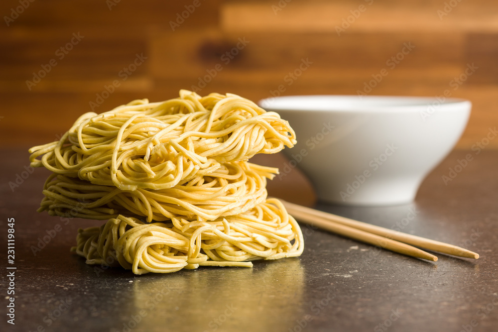 Uncooked instant chinese noodles. Stock Photo | Adobe Stock
