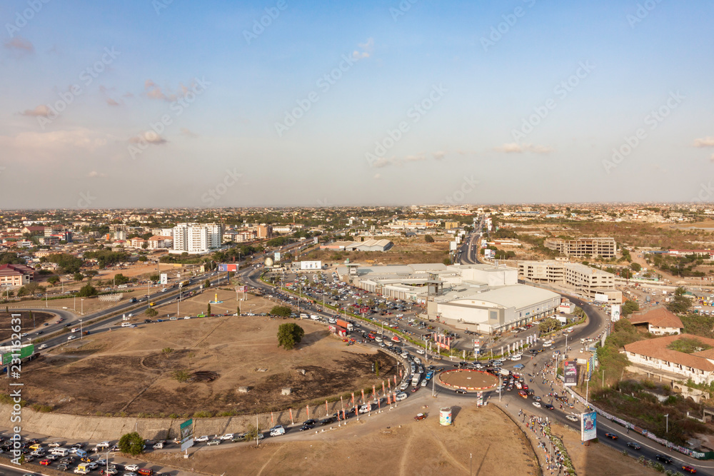 High view point cityscape of Accra, Ghana. Traffic jam on a roundabout ...