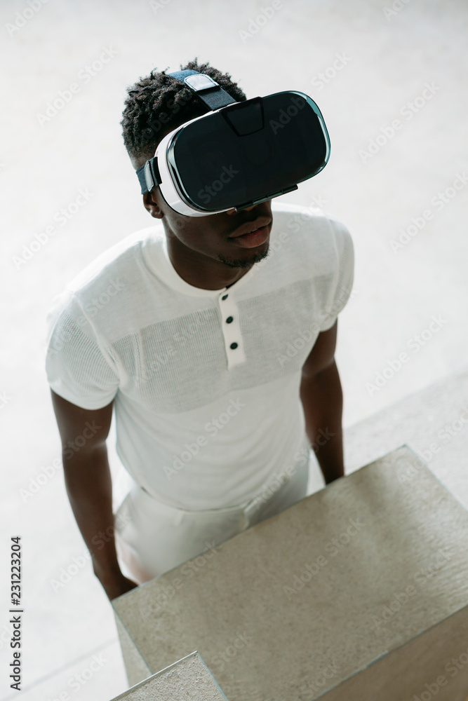 Stylish male model using vr glasses. Stock Photo | Adobe Stock