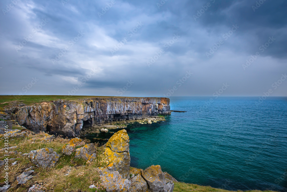 Scenic landscape of Pembrokeshire coast, Uk.Cliff head cutting into the ...