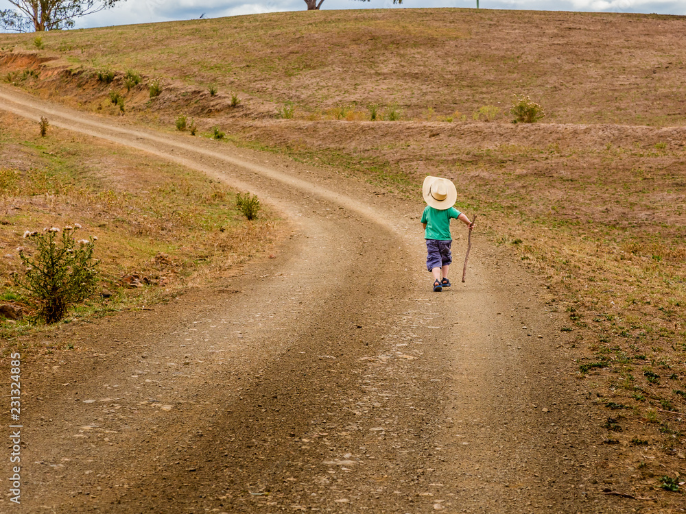 Boy Walking Alone