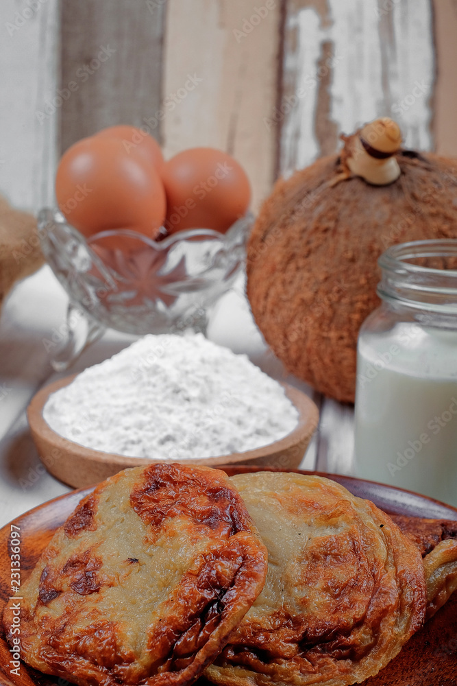 Akok Kedut, egg, coconut, flour , coconut milk and Pandan leaf on ...