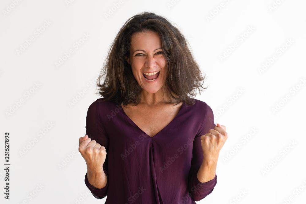 Excited Caucasian woman shouting and celebrating success. Happy and ...