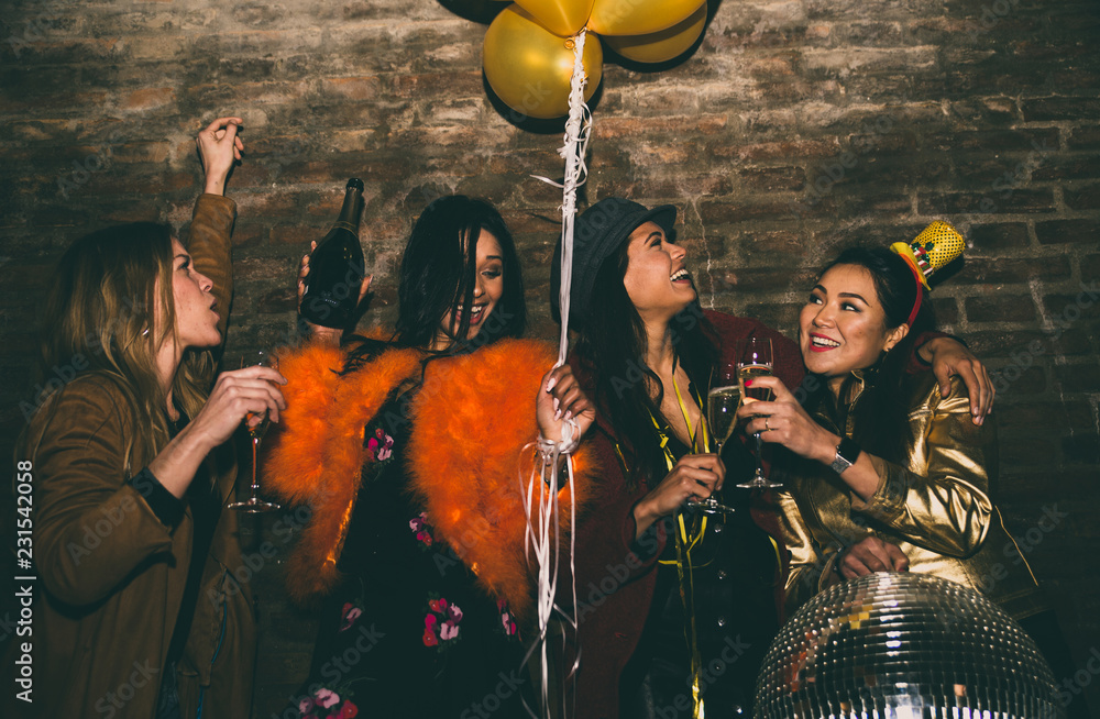 Group of girls celebrating and having fun the club. Concept about women ...