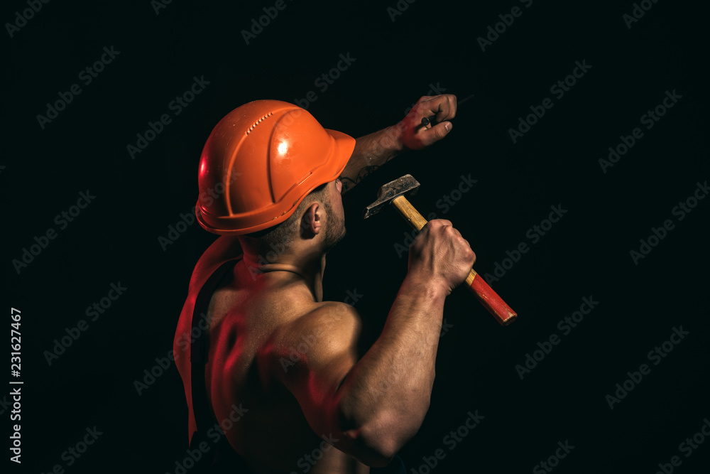 Still under construction. Hard worker use muscular strength. Man work ...