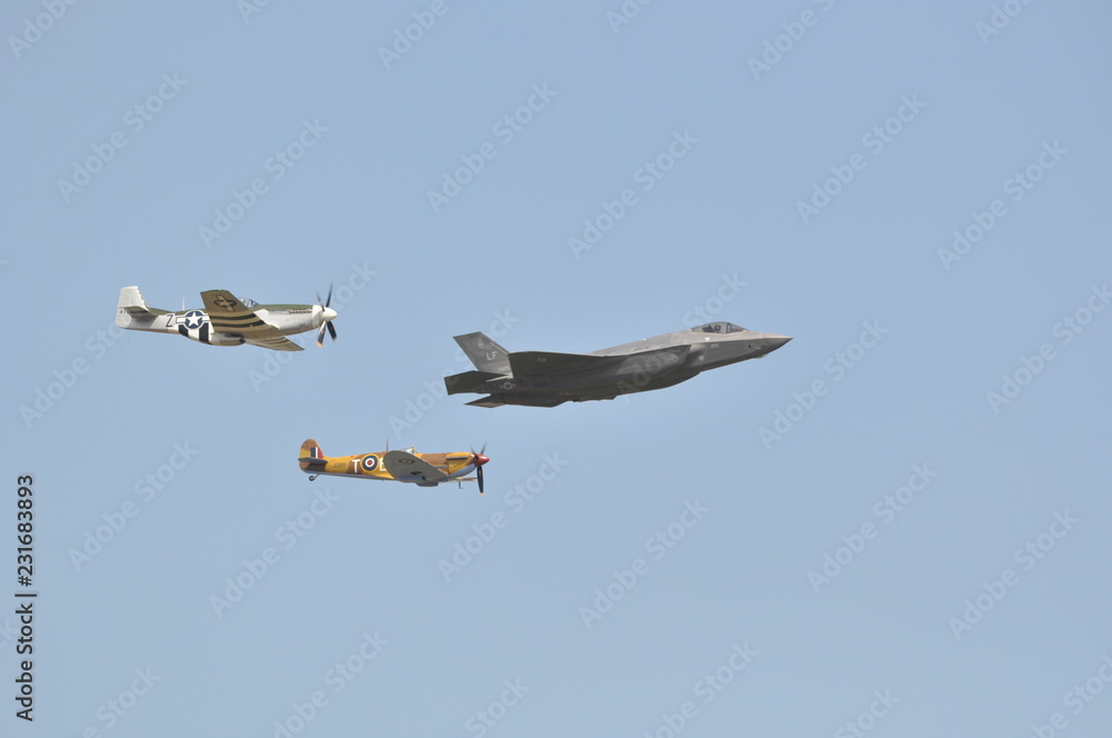 Spitfire, P-51 Mustang & F35 in formation Stock Photo | Adobe Stock