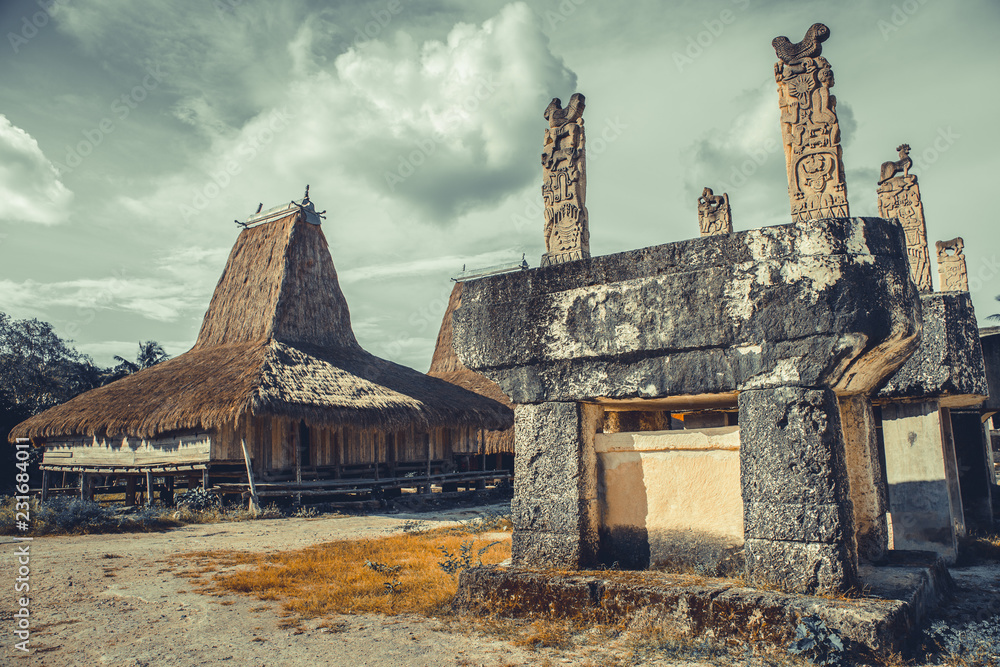 Authentic tomb, straw roof house. Sumba village. Indonesia. The ethnic ...