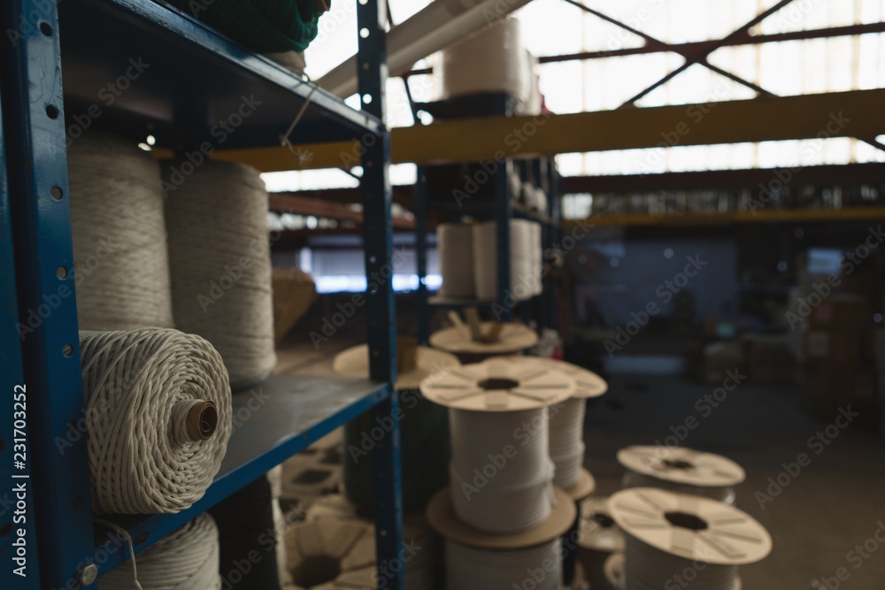 Rope roll arranged in pallet rack Stock Photo | Adobe Stock