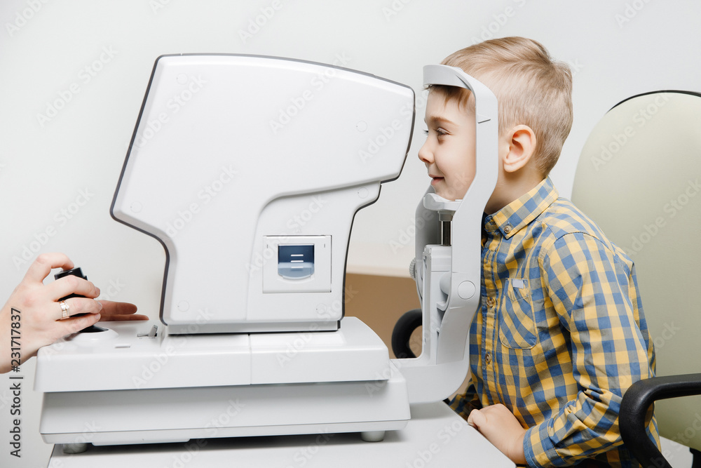 Female doctor hands carry out diagnostics of intraocular pressure on ...