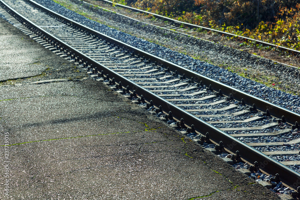 Railroad tracks with concrete sleepers. Detailed image of a railway ...