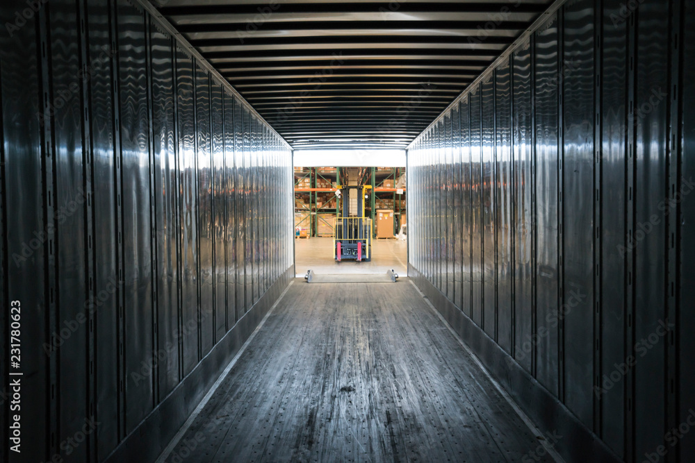 Trailer interior at warehouse loading dock Stock Photo | Adobe Stock