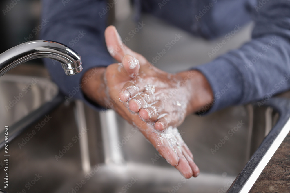 Washing hands with soap and water at the faucet, Hygiene concept Stock ...