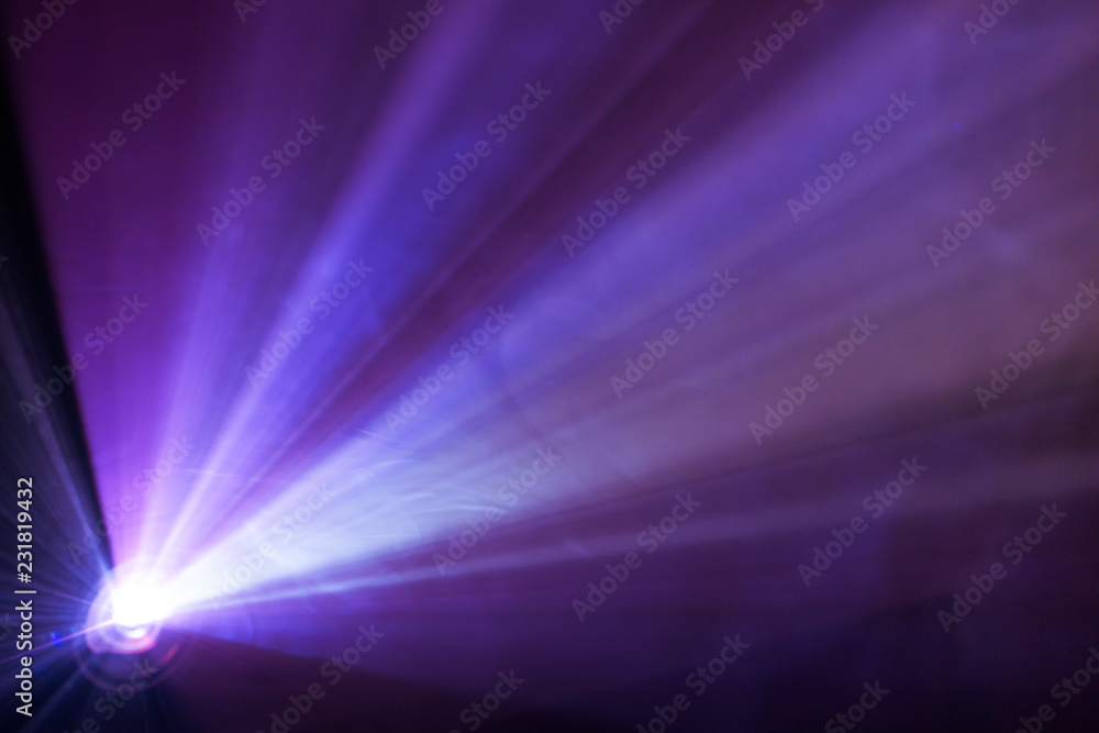 blur beautiful purple color wide lens projector with light beam for ...