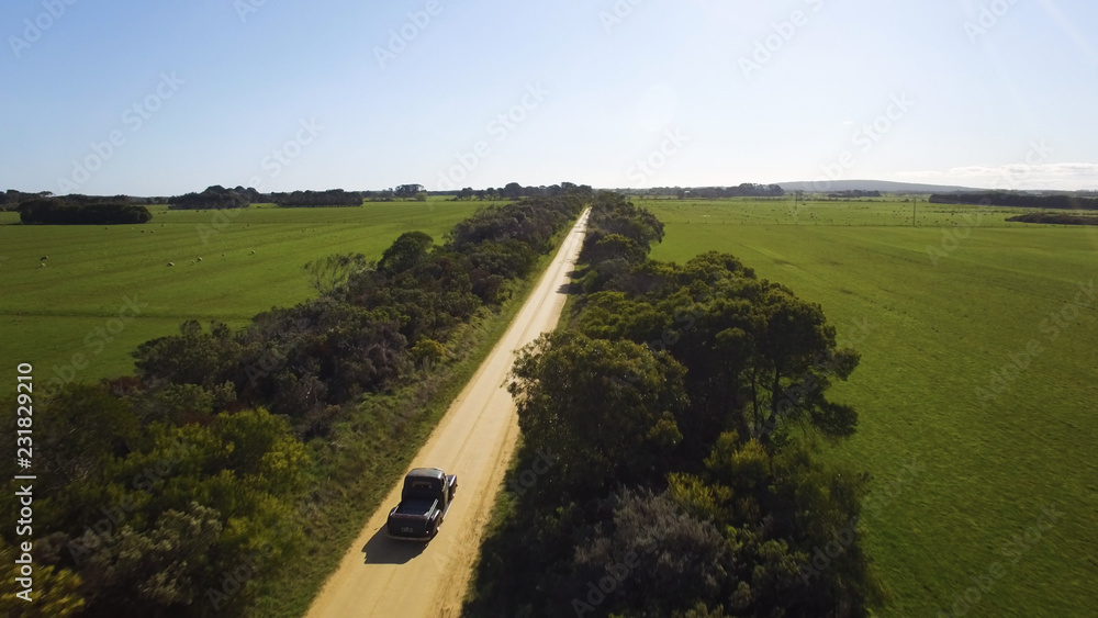Car Driving Down Country Road