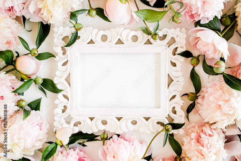 Carved, white frame decorated of beautiful pink peonies on white ...