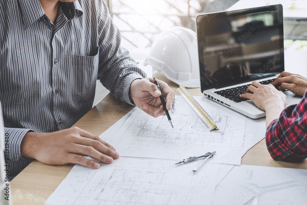 Architecture Engineer Teamwork Meeting, Drawing and working for ...