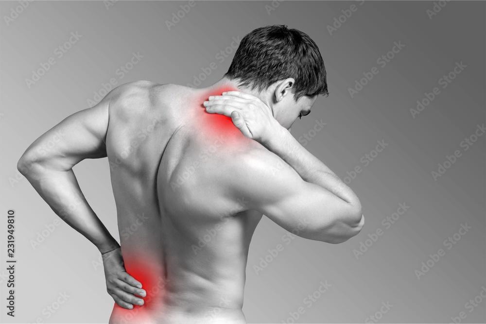 Strong man with neck pain, back view Stock Photo | Adobe Stock
