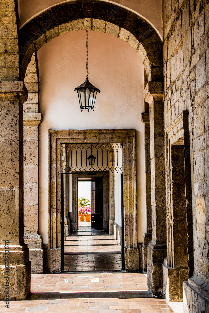 Internal corridor with its pillars and stone arches of the Cabañas ...
