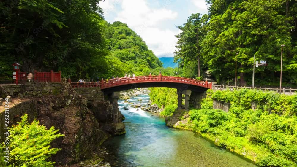 Stockvideo The beautiful emerald Daiya River flows under the red Unesco ...
