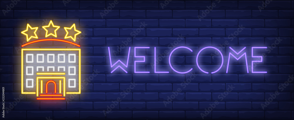 Welcome neon sign. Hotel building with three stars on brick wall ...