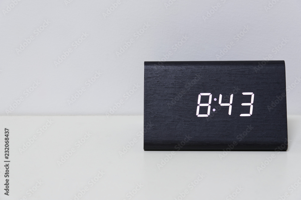 Black digital clock on a white background showing time 8:43 Stock Photo ...