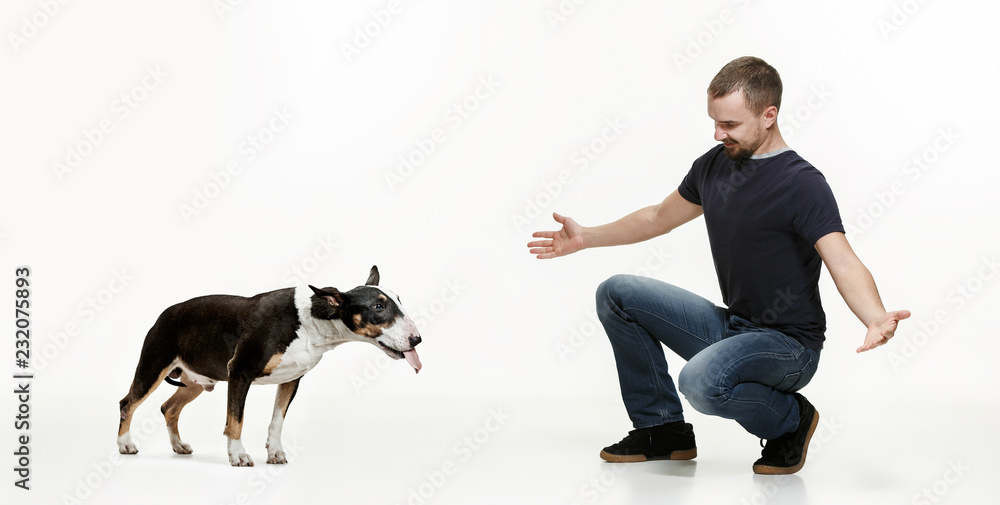 Emotional Portrait of surprised man and his dog, concept of friendship ...