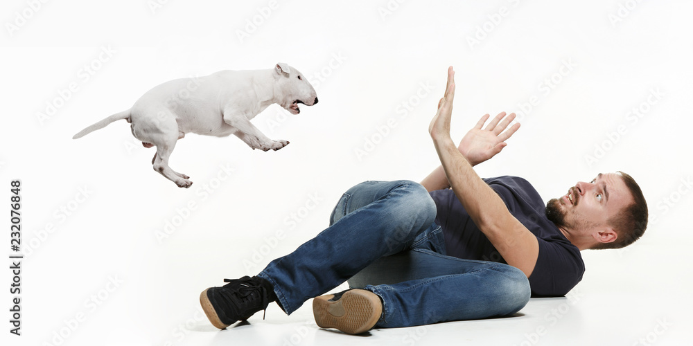 Emotional Portrait of scared man and his dog, concept of friendship and ...