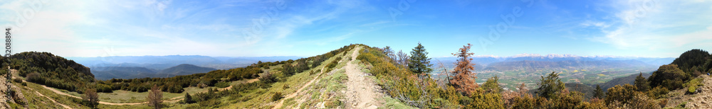 A 360 landscape of a path on the edge of Peña Oroel mount, with the ...