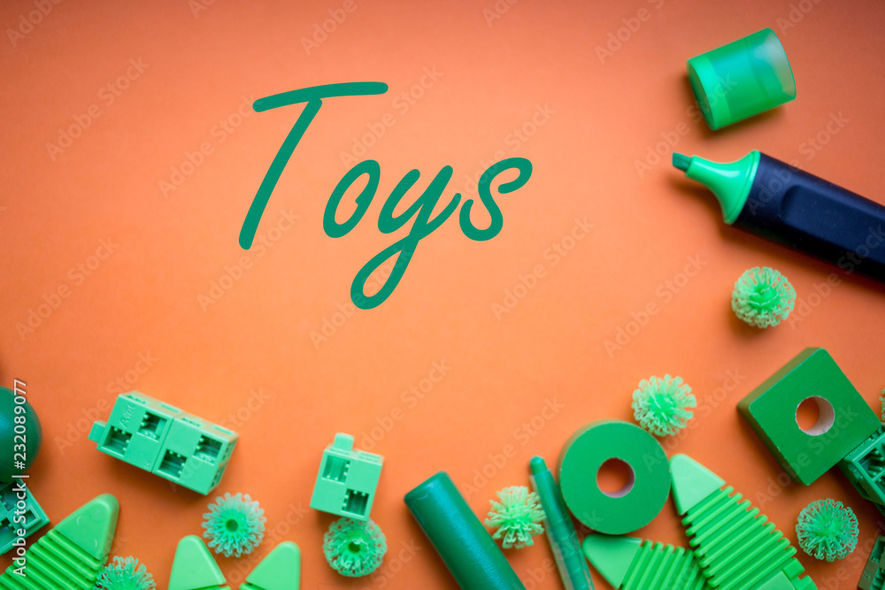 various kids toys background in green colours, colorful assorted Stock ...