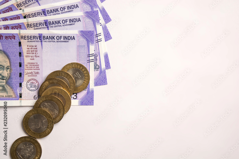 All new 100 Rupees Indian Currencies and coins on islolated background ...