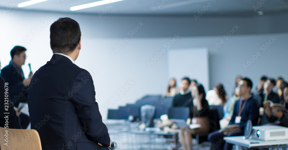 Panel Speaker on Stage Presenting Vision and Ideas. Conference Lecture ...