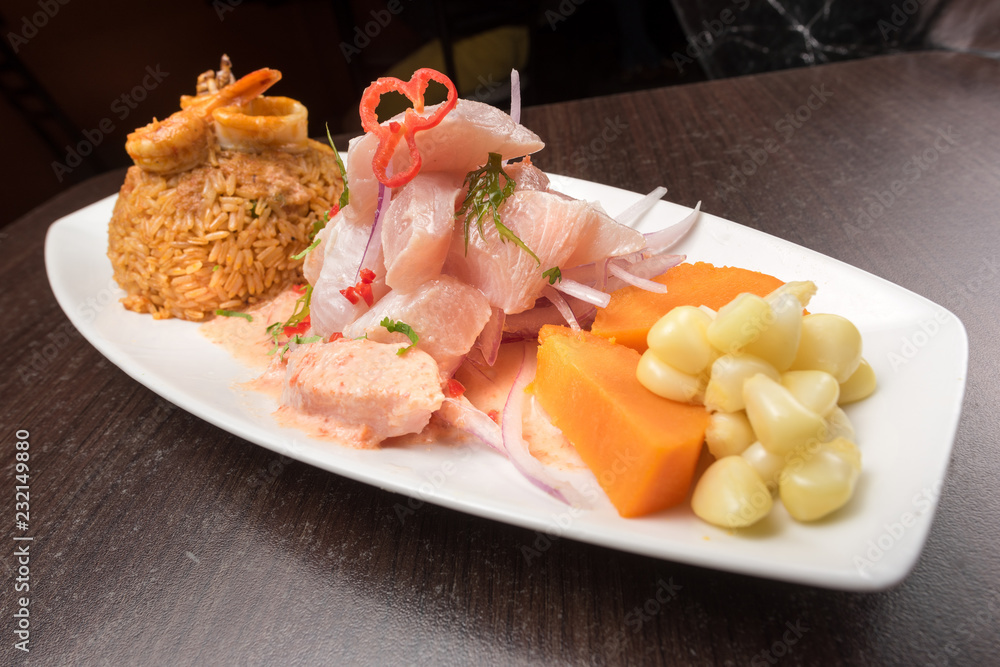 Peruvian Food: Ceviche with fried rice. Stock Photo | Adobe Stock