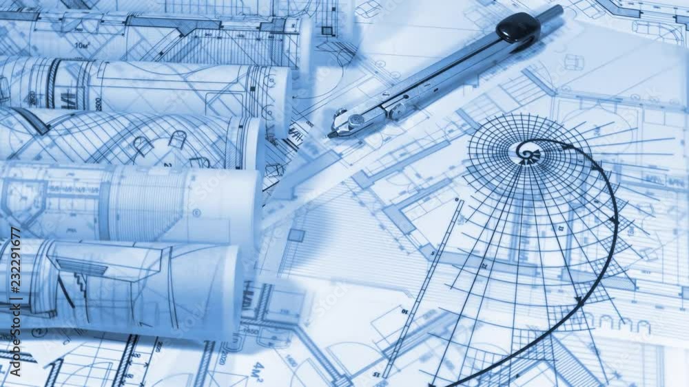 Blueprints - rolls of architectural drawings, compass and drawing of ...