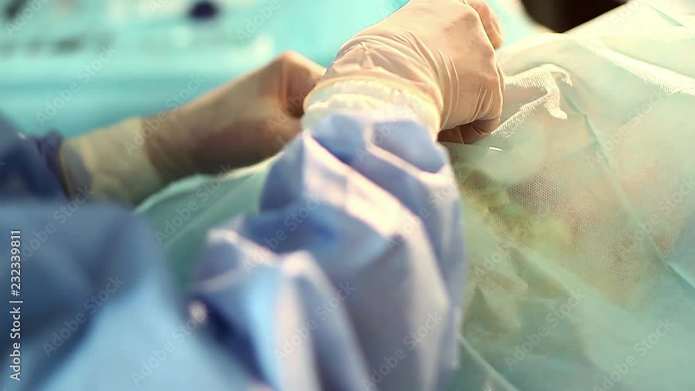 doctor hands on the ophthalmic operating, The operation on the eye ...