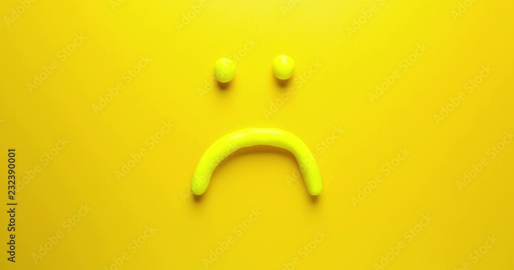 4K stop motion animation of a shocked smiley face made out of modelling ...
