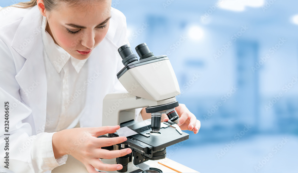 Scientist researcher using microscope in laboratory. Medical healthcare ...