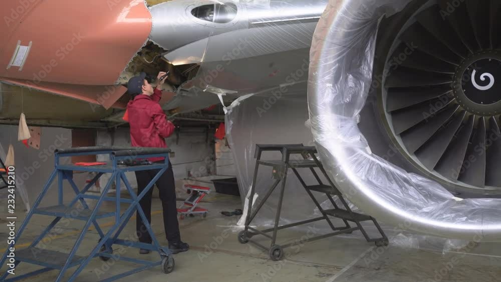 Repair of the aircraft fuselage. The color of the fuselage of the ...