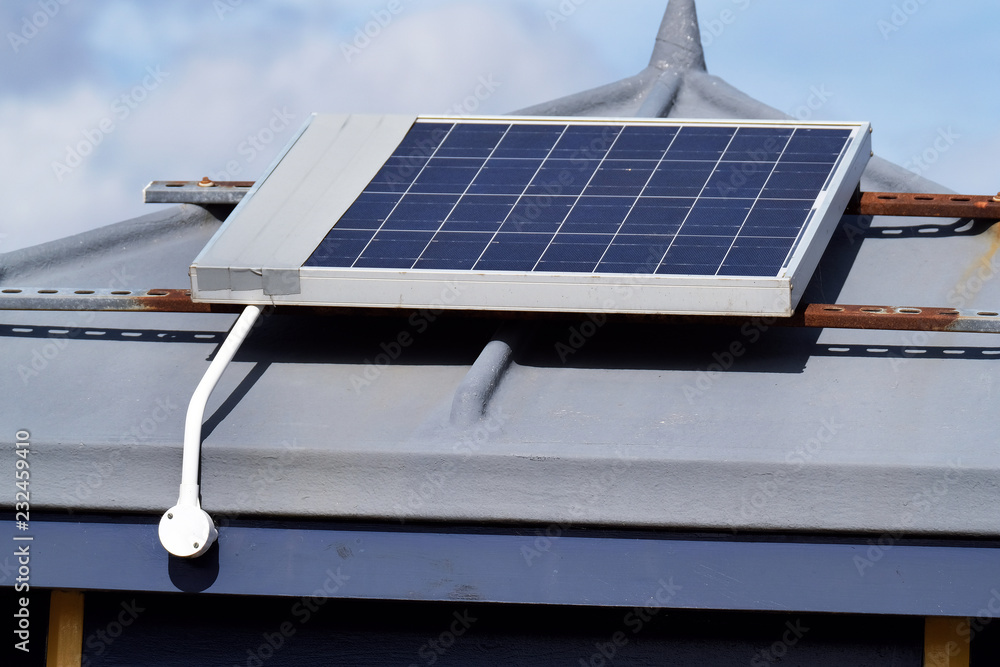 solar panel on the roof of seaside front kiosk. Stock Photo | Adobe Stock