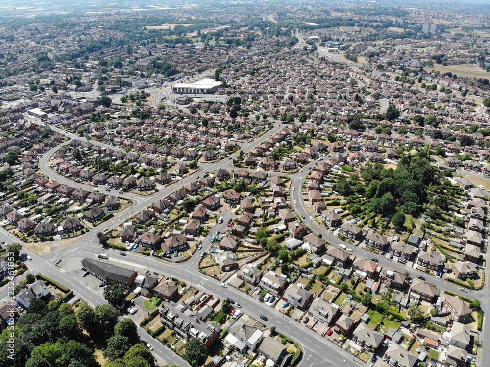 Typical UK Town aerial photo showing rows of houses, roads, parks and ...